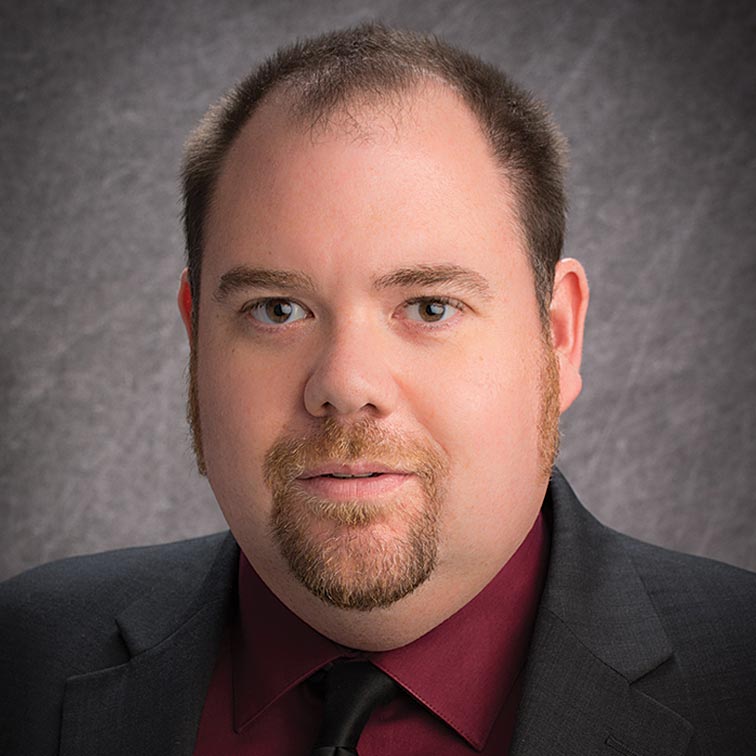 Andrew C. Thompson – Poznak Dyer Kanar Schefsky Thompson PLC